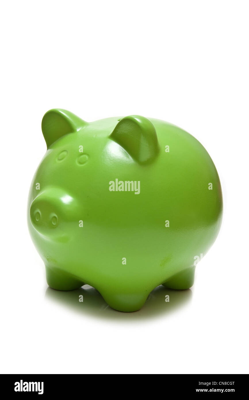 Green piggy bank money box isolated on a white studio background Stock ...