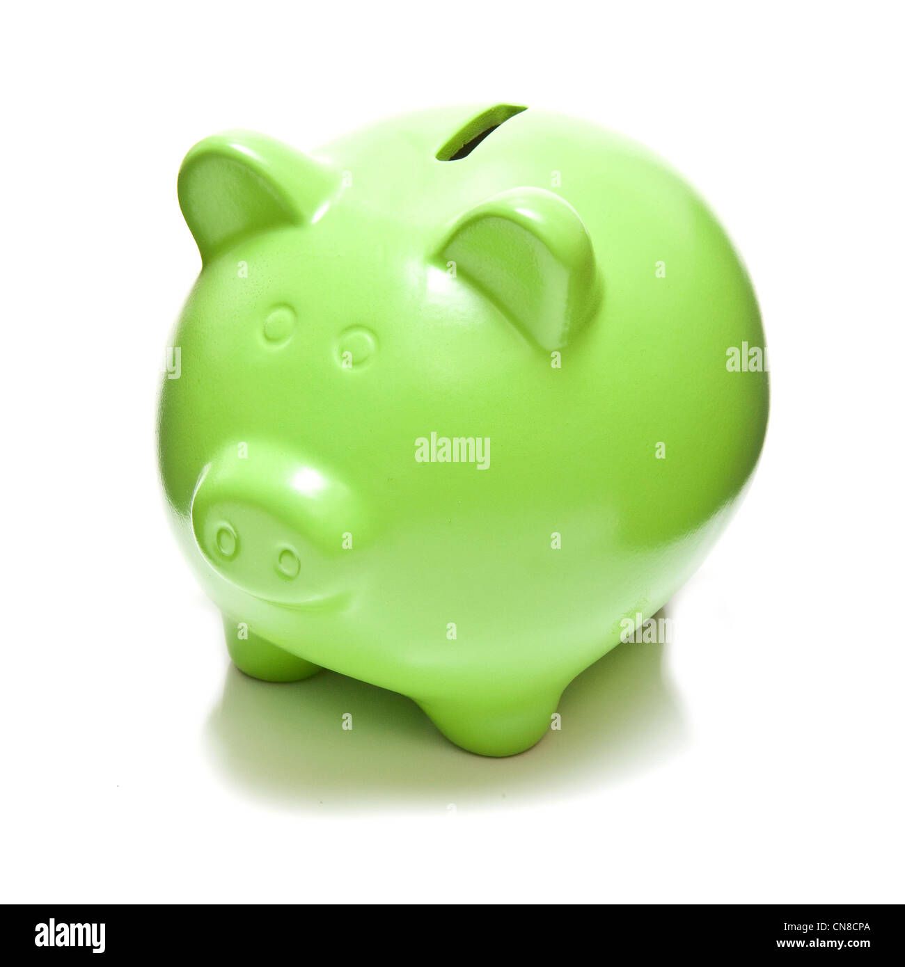 Green piggy bank money box isolated on a white studio background Stock ...