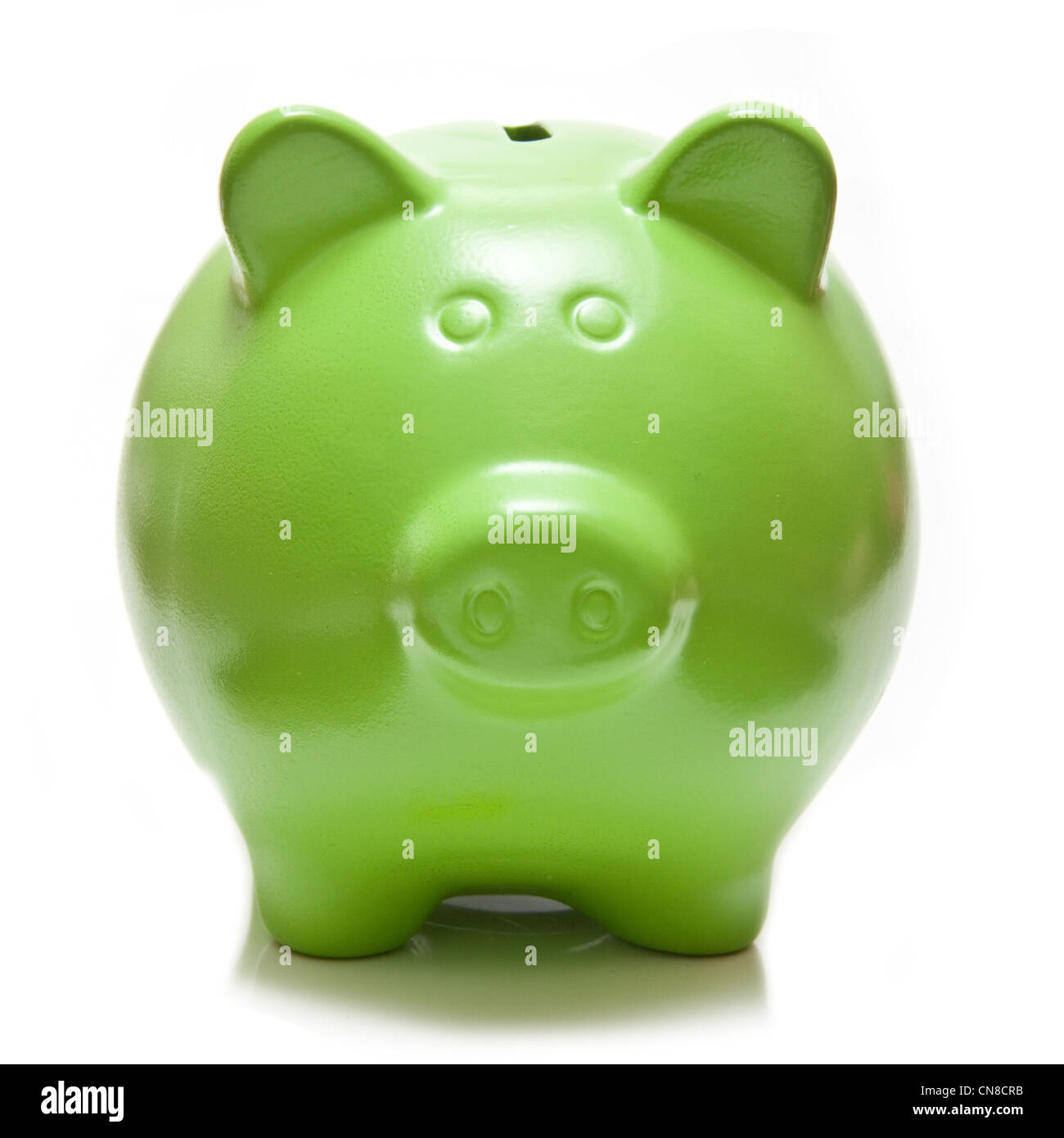 Green piggy bank money box isolated on a white studio background Stock ...