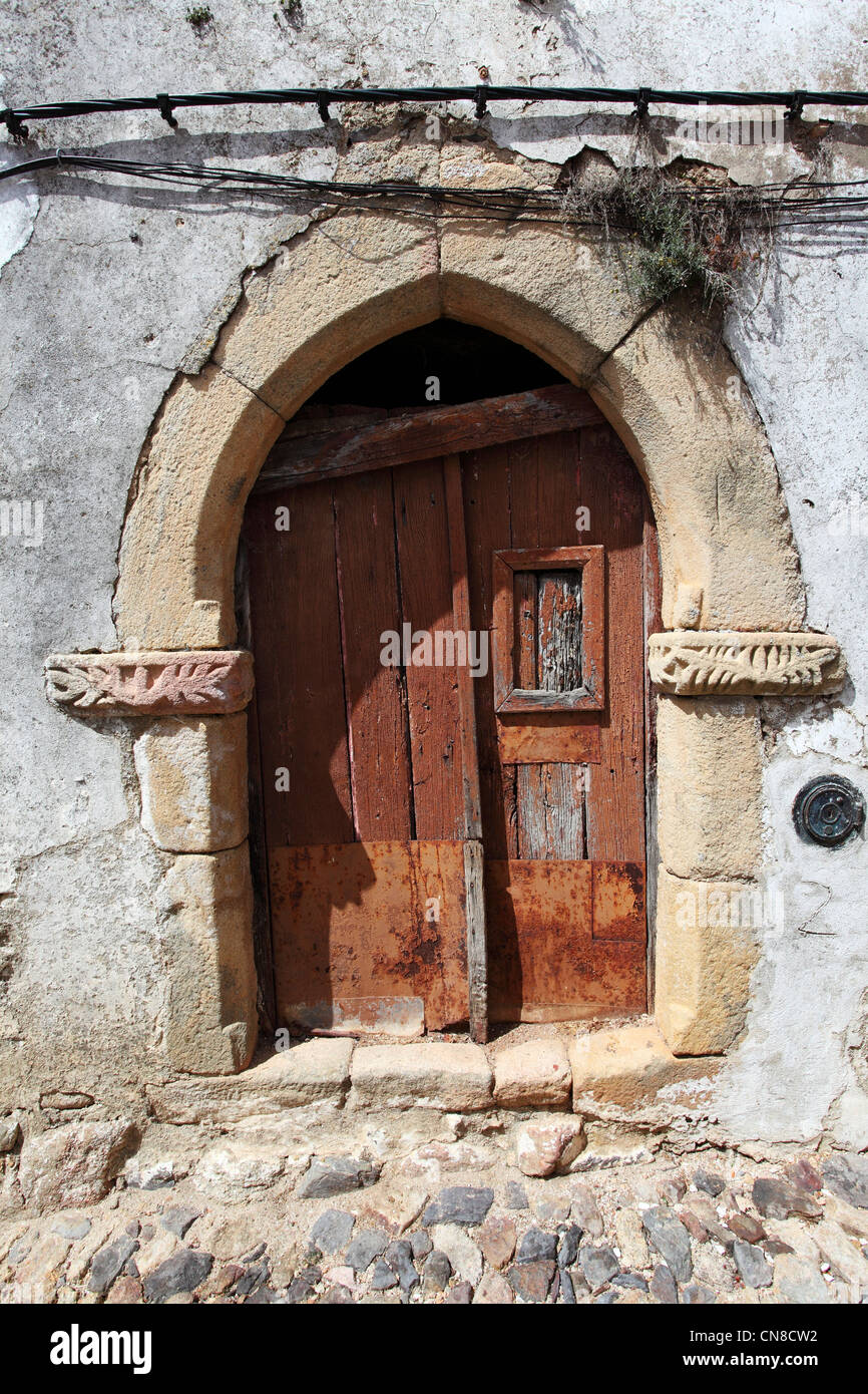 A medieval arched doorway in Castelo de Vide, Alentejo, Portugal Stock ...
