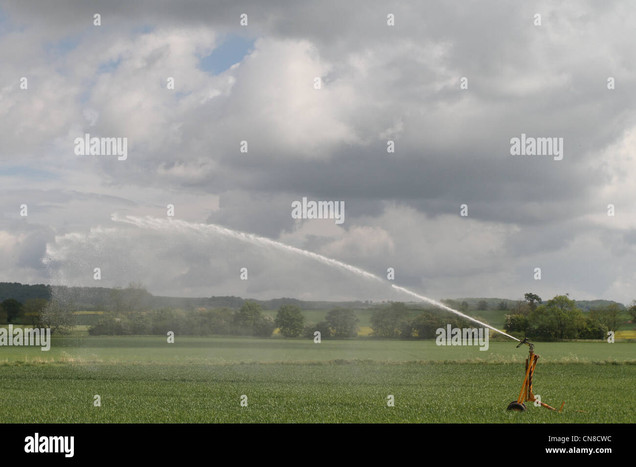 Watering the fields hi-res stock photography and images - Alamy