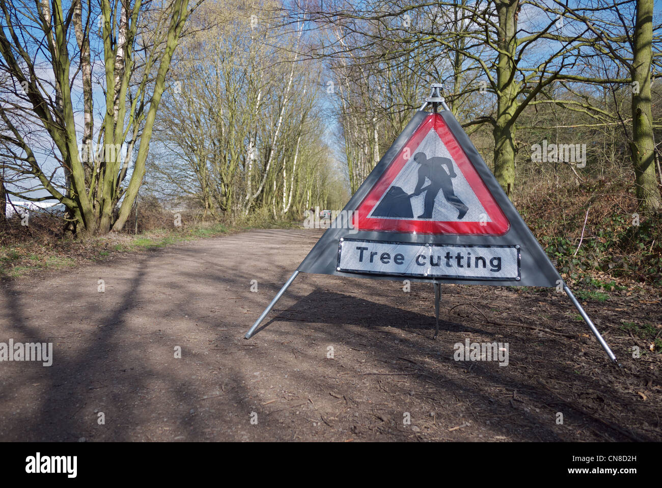 Tree cutting warning sign Stock Photo - Alamy