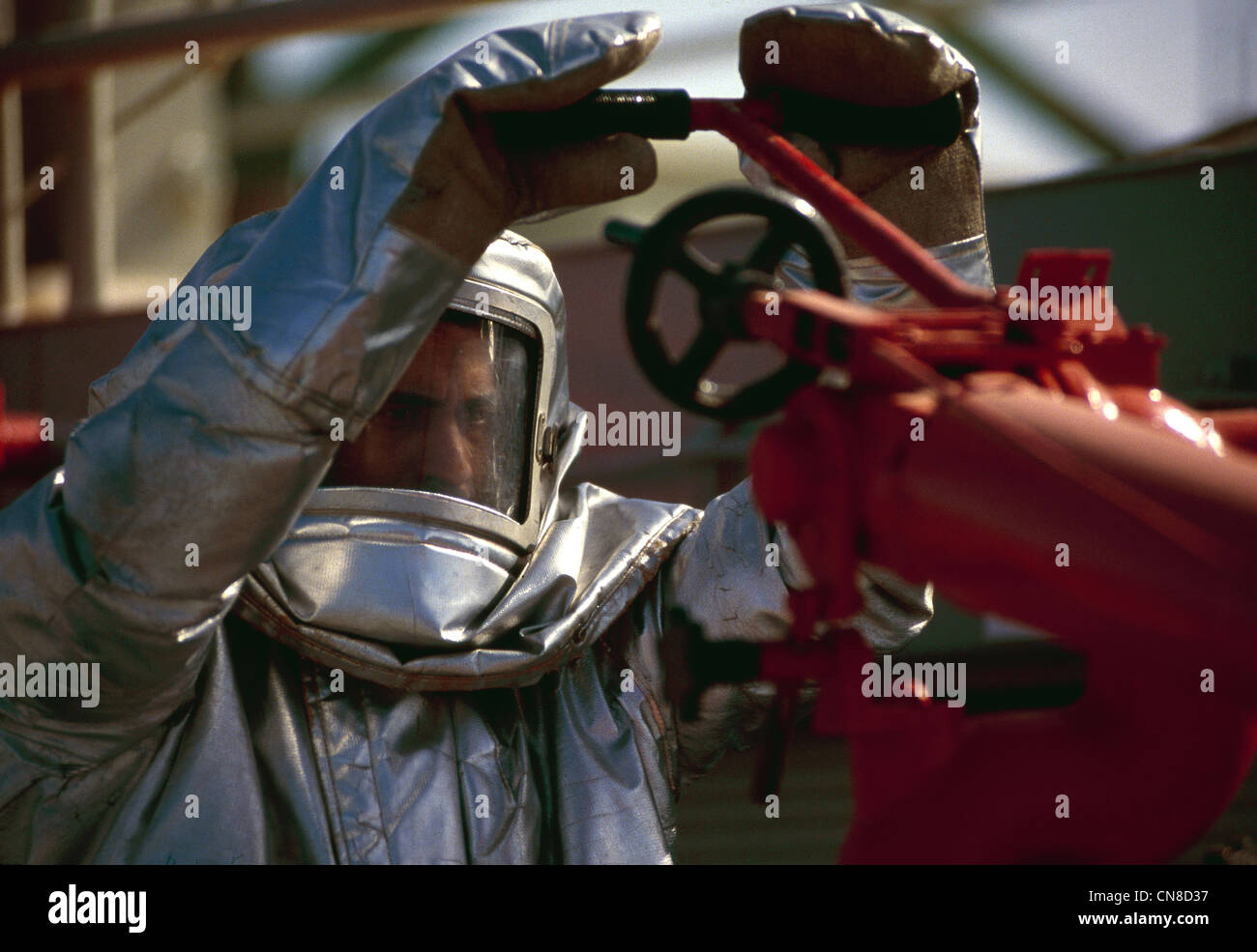 Roughneck action with drill pipe on the rig floor of an offshore ...