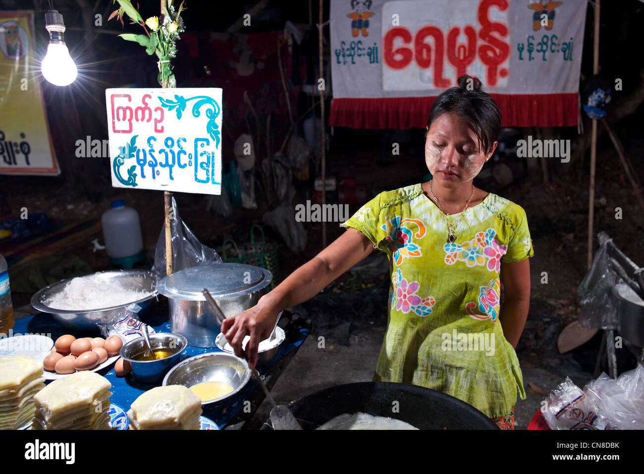 A Burmese Girl Prepares Street Food On The Streets Of Yangon Rangon Myanmar Burma Stock