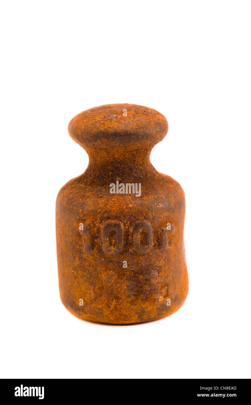 isolated old rusty 100 gramme weight Stock Photo - Alamy
