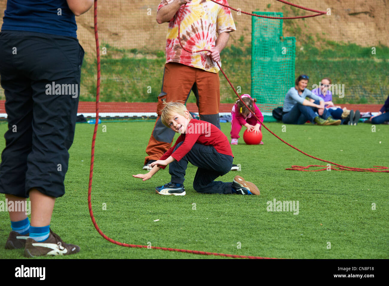 Group of preschool children do sports on sports field outside Stock ...