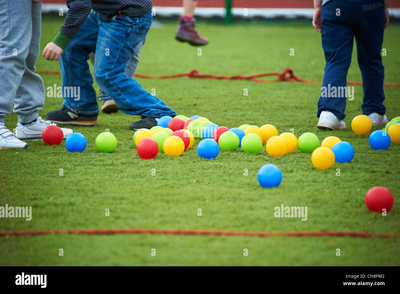 Group of preschool children do sports on sports field outside Stock ...