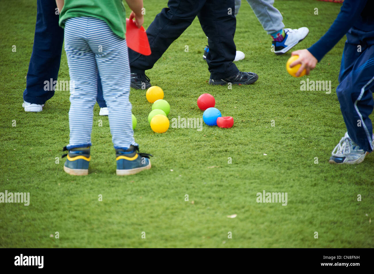 Group of preschool children do sports on sports field outside Stock ...