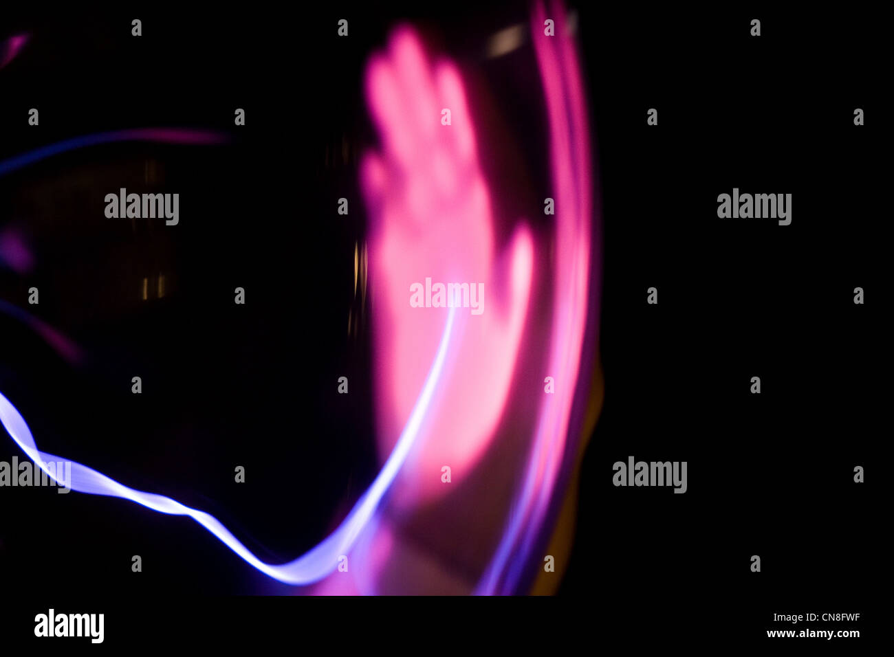 Spooky blue Lightning and hand for background Stock Photo - Alamy