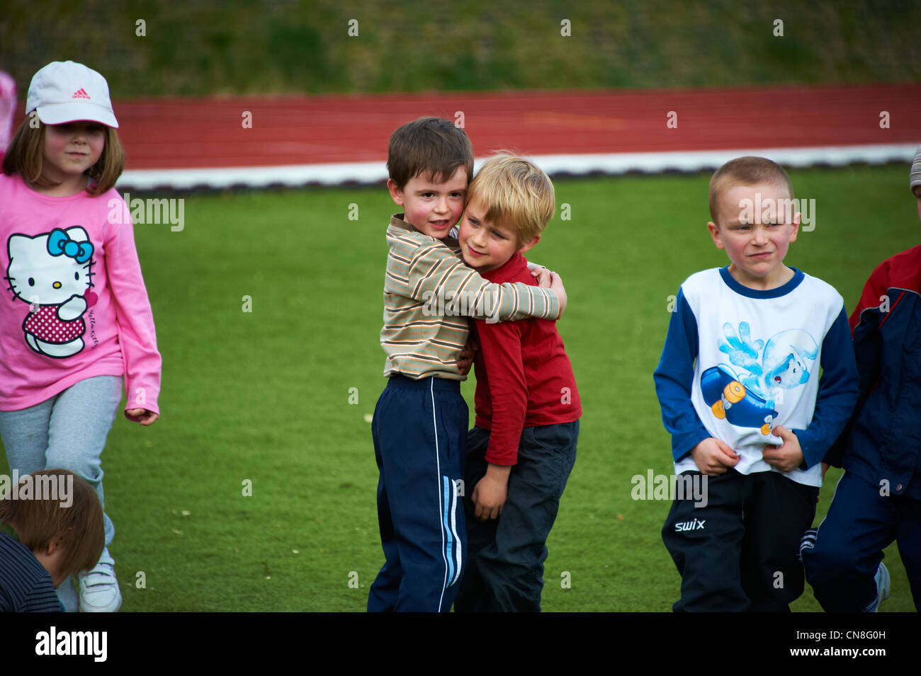 Group of preschool children do sports on sports field outside Stock ...