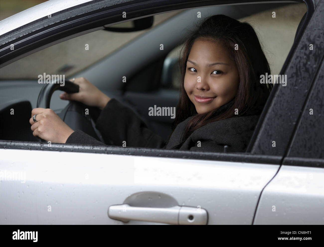 young female driver in modern car Stock Photo - Alamy