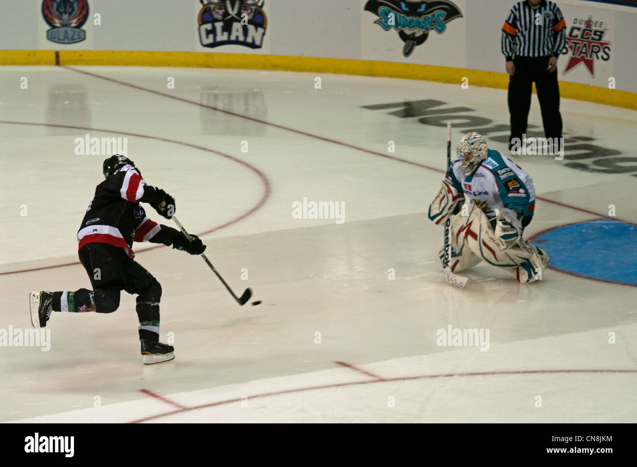 Kenton Smith of Cardiff Devils shooting to score the winning goal in ...