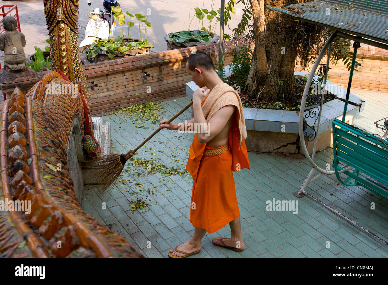 Monk sweeping temple floor hi-res stock photography and images - Alamy