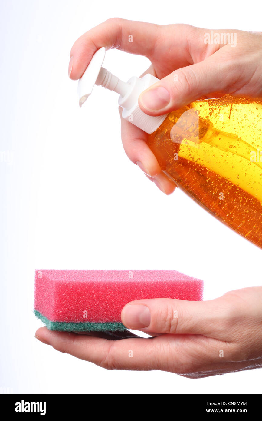 Applying liquid soap. Two hands holding bottle with liquid soap ...