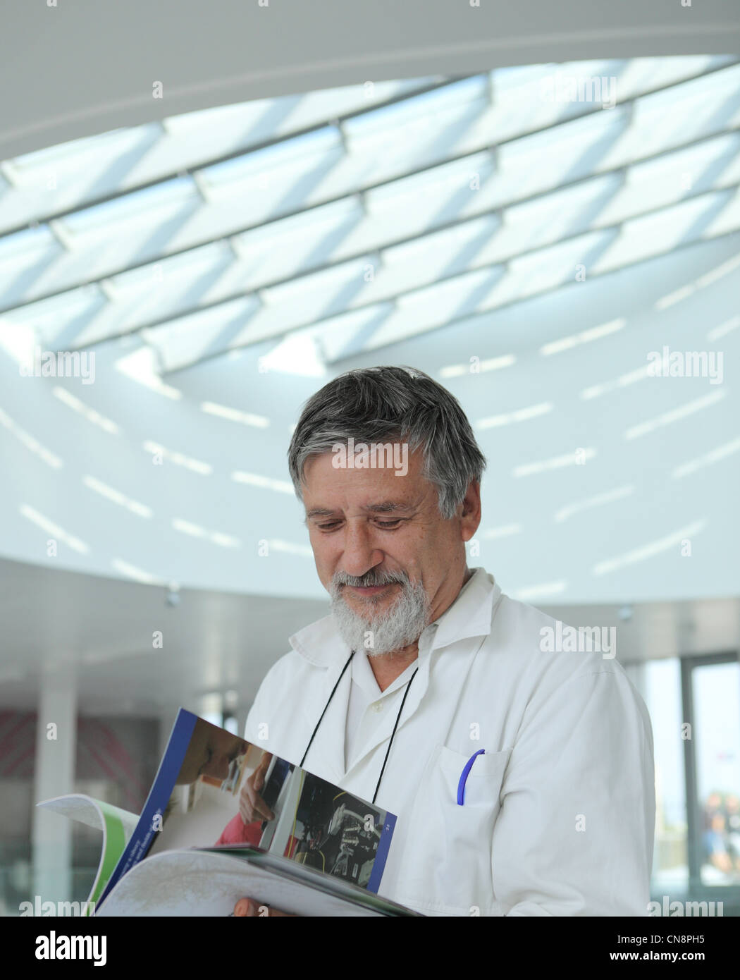 Renowned scientist/doctor in a research center/hospital looking ...