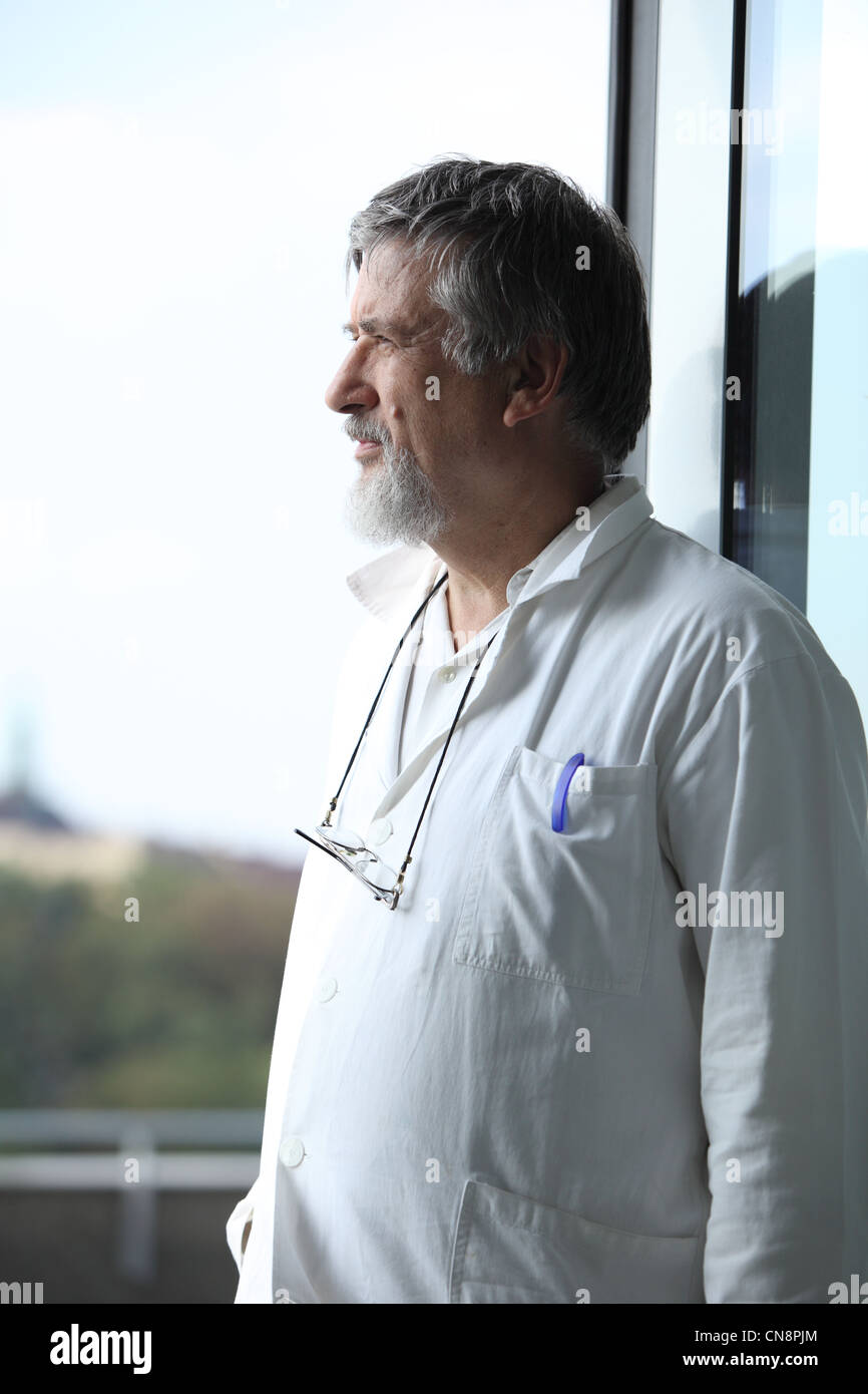 Renowned scientist/doctor in a research center/hospital looking ...