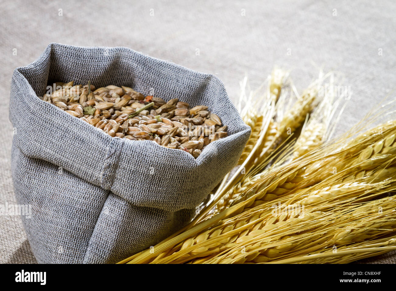 Closeup wheat seed in canvas bag Stock Photo - Alamy