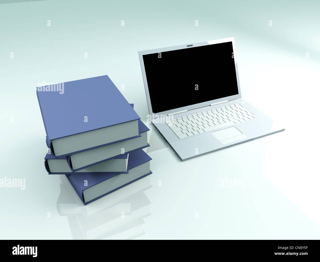 A Laptop with books Stock Photo - Alamy