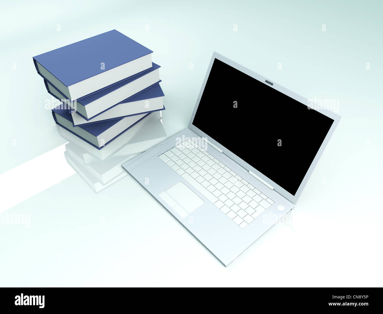 A Laptop with books Stock Photo - Alamy