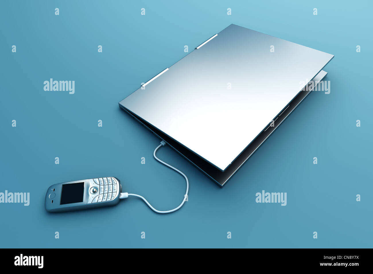 A cell phone and a Laptop Stock Photo - Alamy