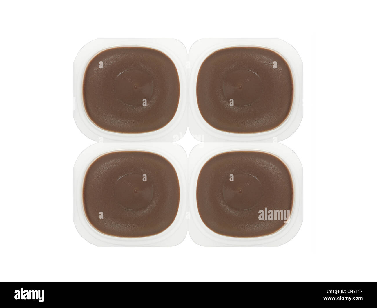 Tubs of chocolate mousse isolated against a white background Stock ...