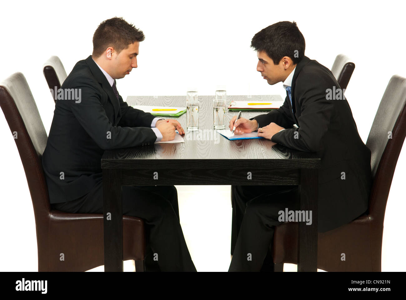 Two people in suits discuss hi-res stock photography and images - Alamy