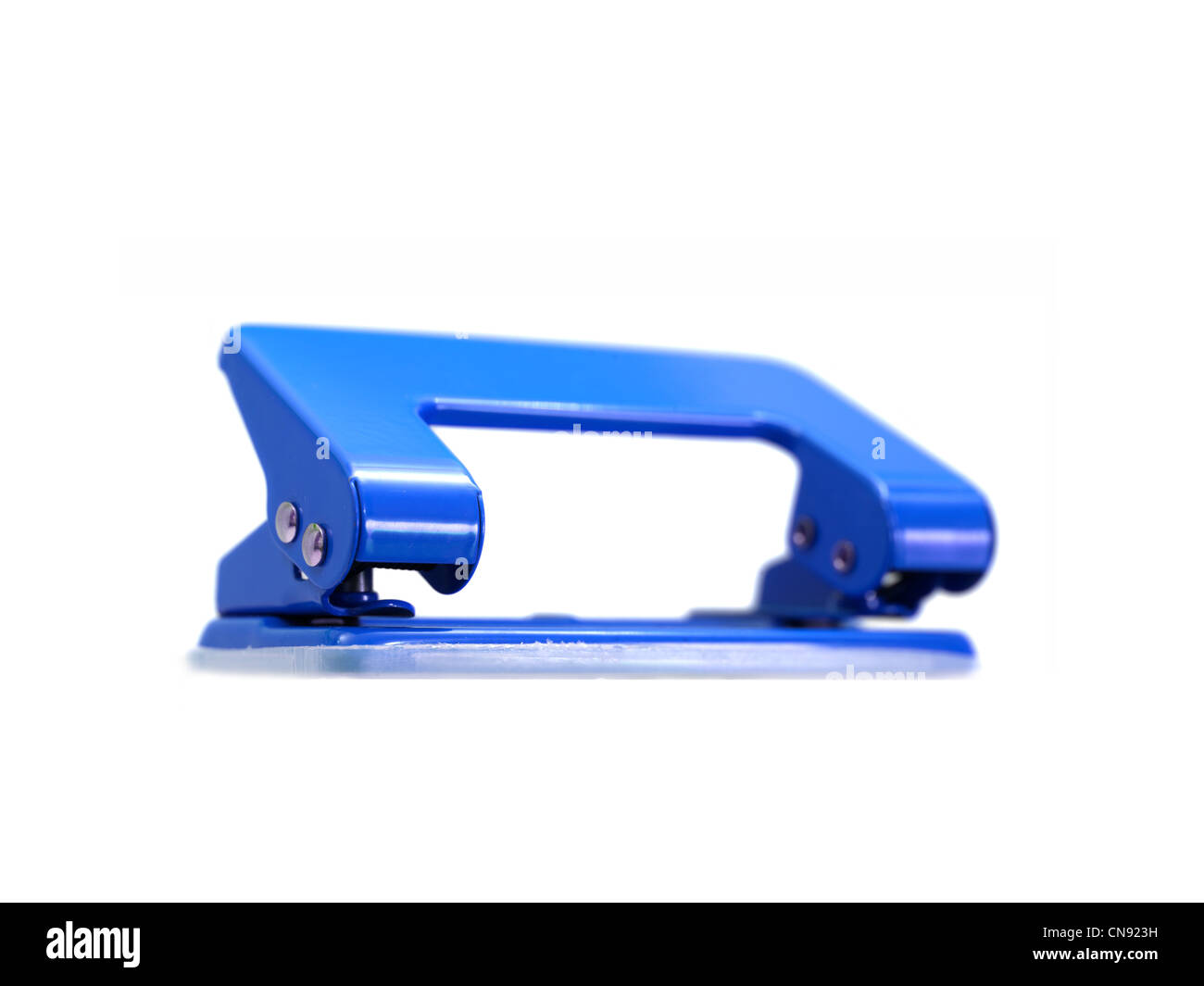 A hole punch isolated against a white background Stock Photo - Alamy