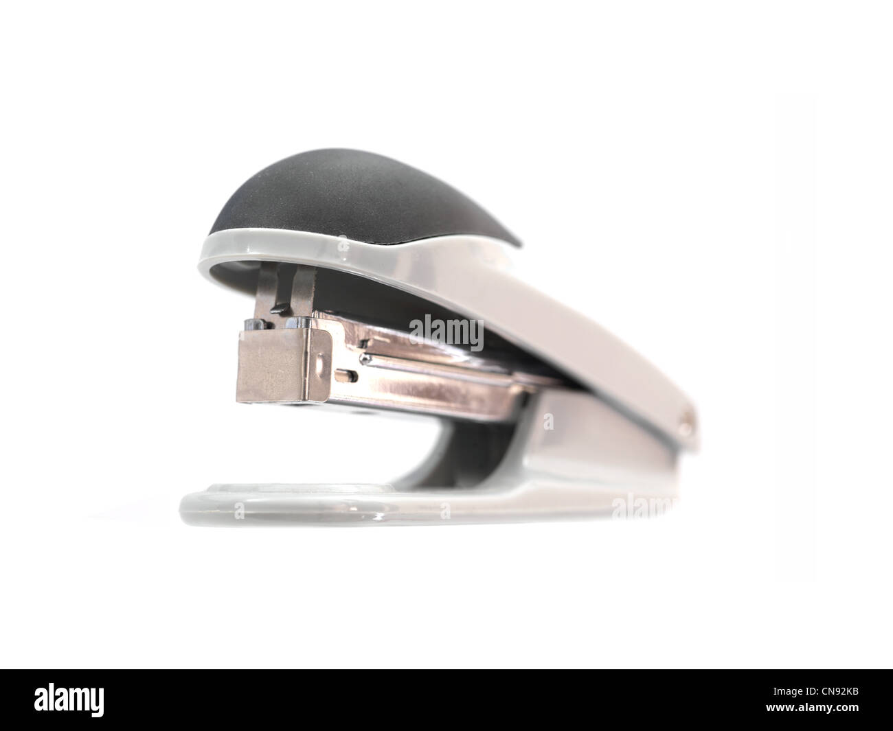 An office stapler isolated against a white background Stock Photo - Alamy