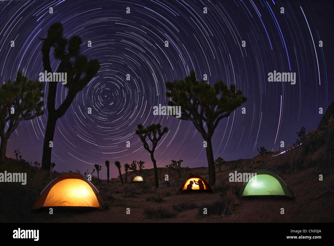 Illuminous Light Painted Landscape of Camping and Stars Stock Photo - Alamy