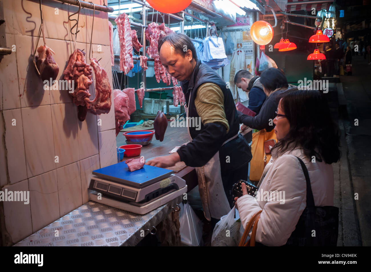 Hong Kong, 9 Jan. 2011 Outdoor butcher still open on Gage Street in old ...