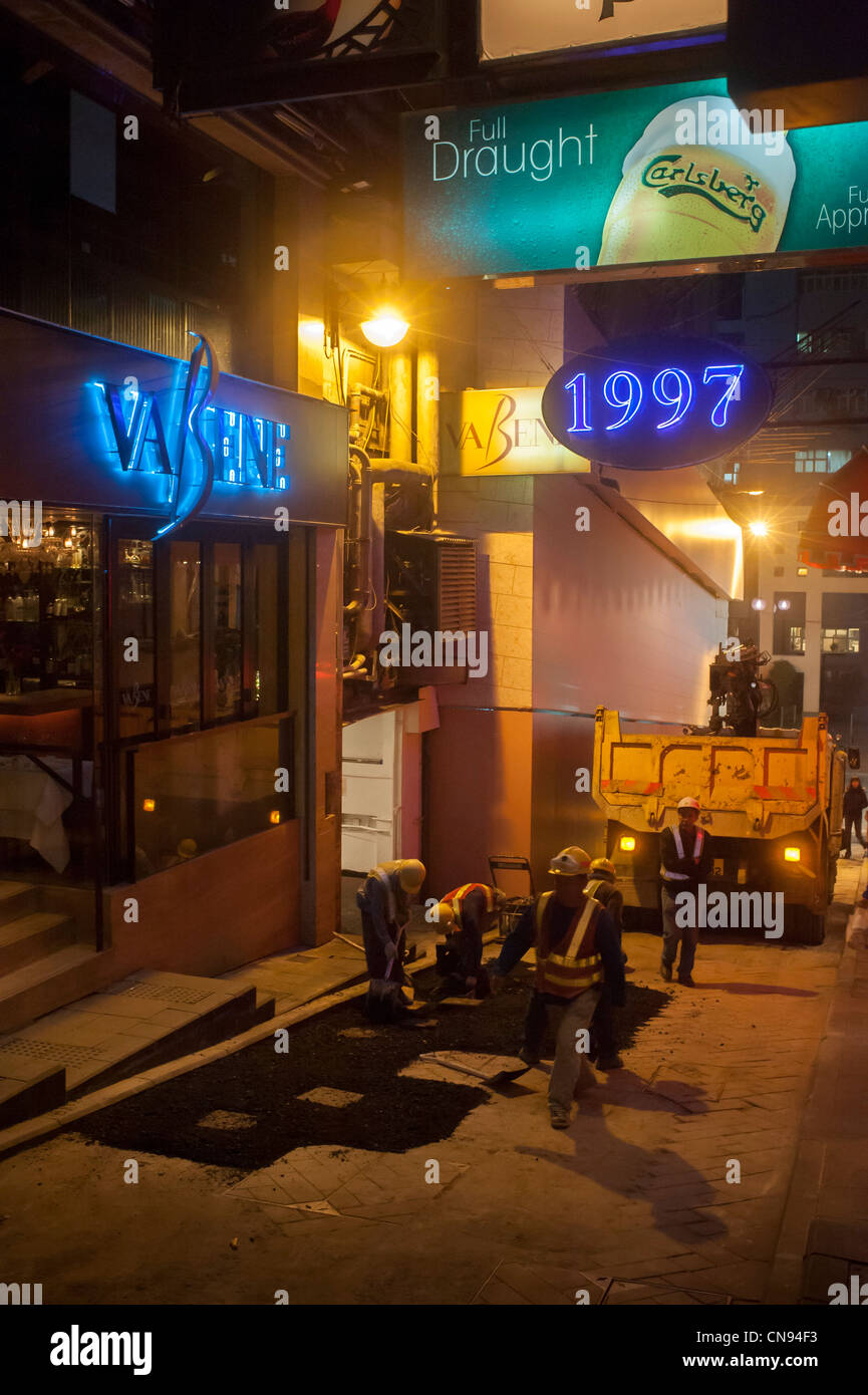 Street work opposite famous Club 97 in Lan Kwai Fong in old Central on ...
