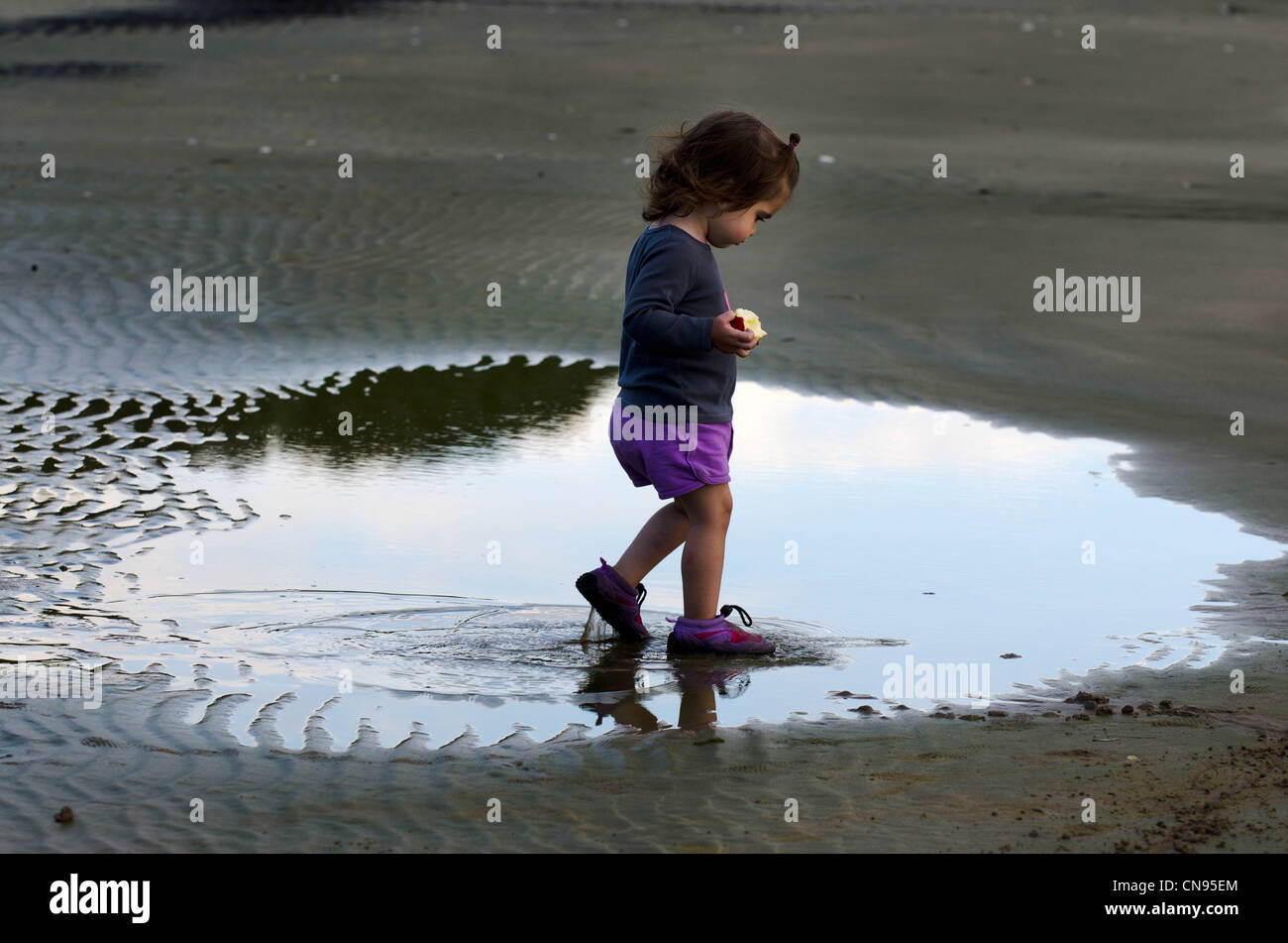 Girl Raincoat Puddle High Resolution Stock Photography and Images - Alamy