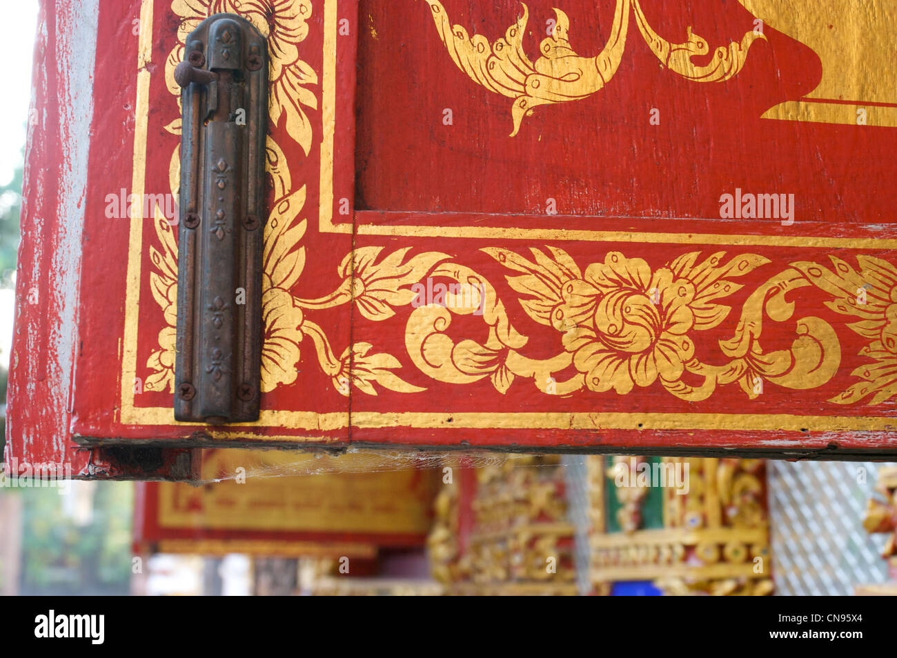 window panels decorated with gold, lock, temple, chiang mai ,Thailand ...