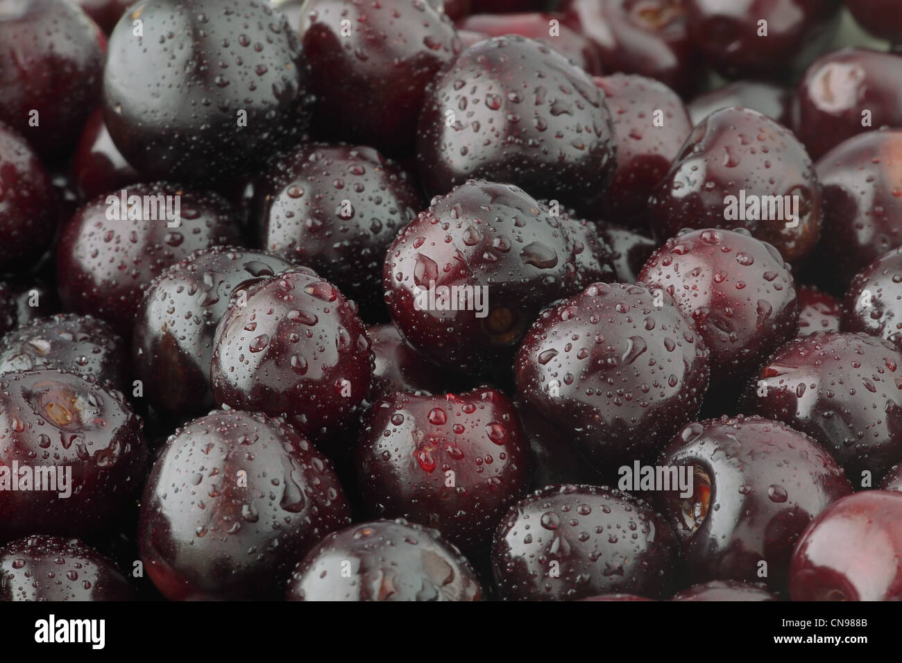 Black cherries hi-res stock photography and images - Alamy