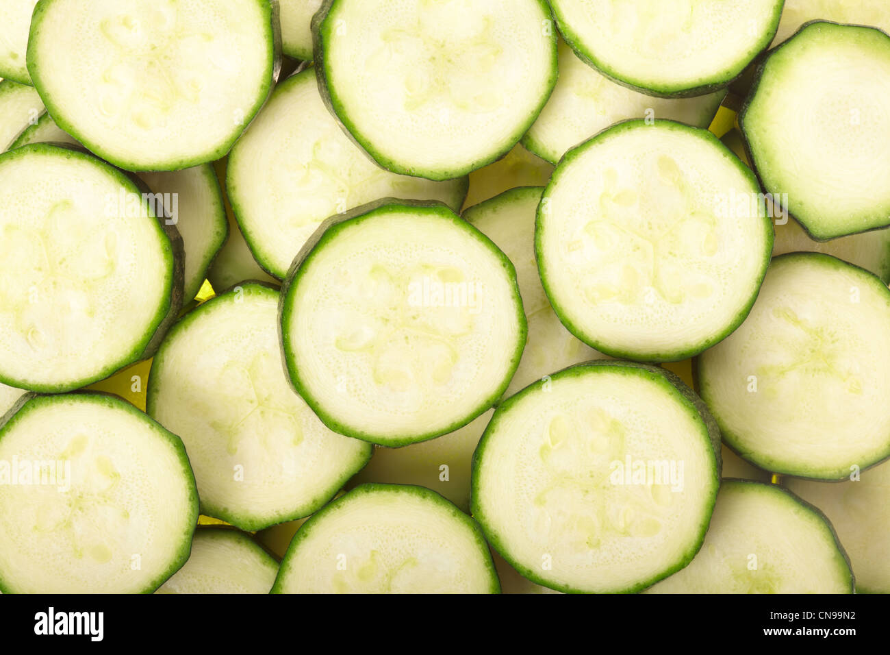 Zucchini sliced background Stock Photo - Alamy