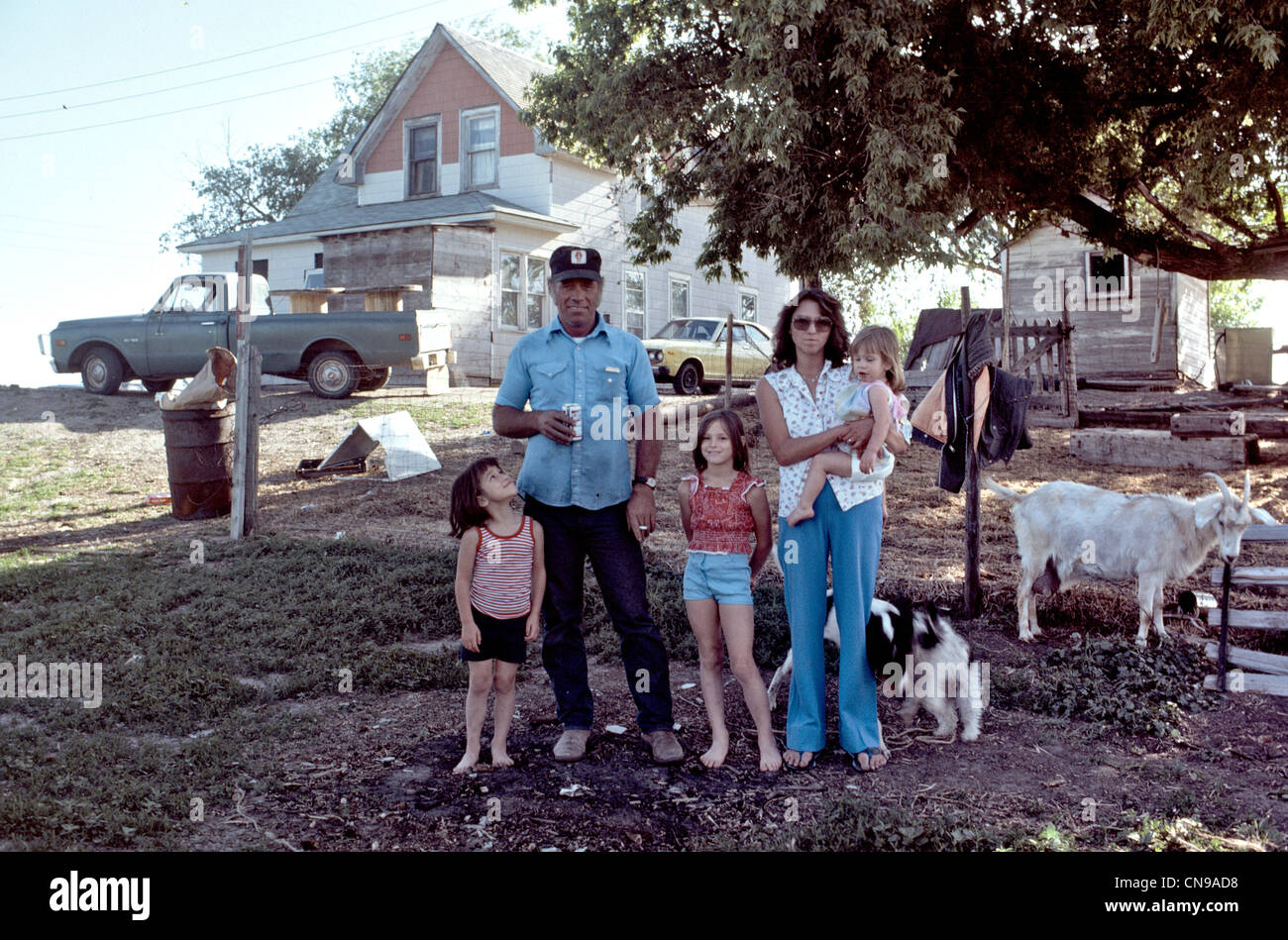 Rural Nebraska family posing in front of their farmhouse Stock Photo ...