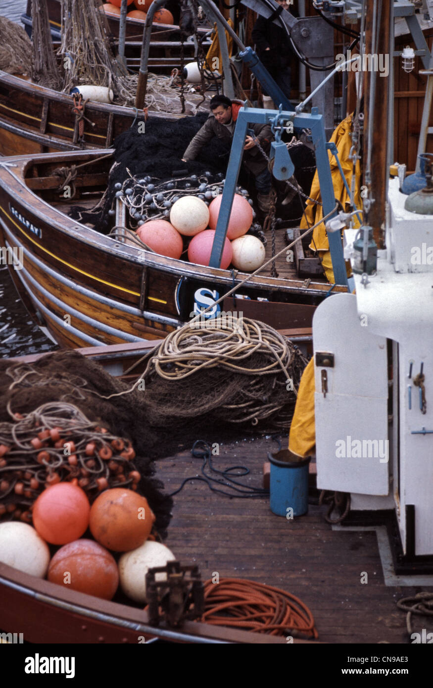 image of the boats in harbour with floats and nets Stock Photo - Alamy