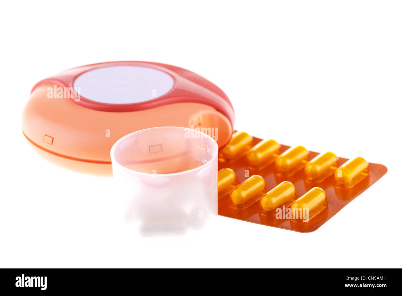 Blisterpack, plastic container with pills and inhaler. Medications and ...