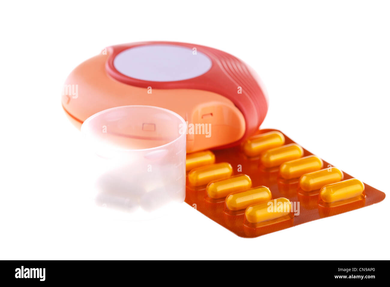 Blisterpack, plastic container with pills and inhaler. Medications and ...