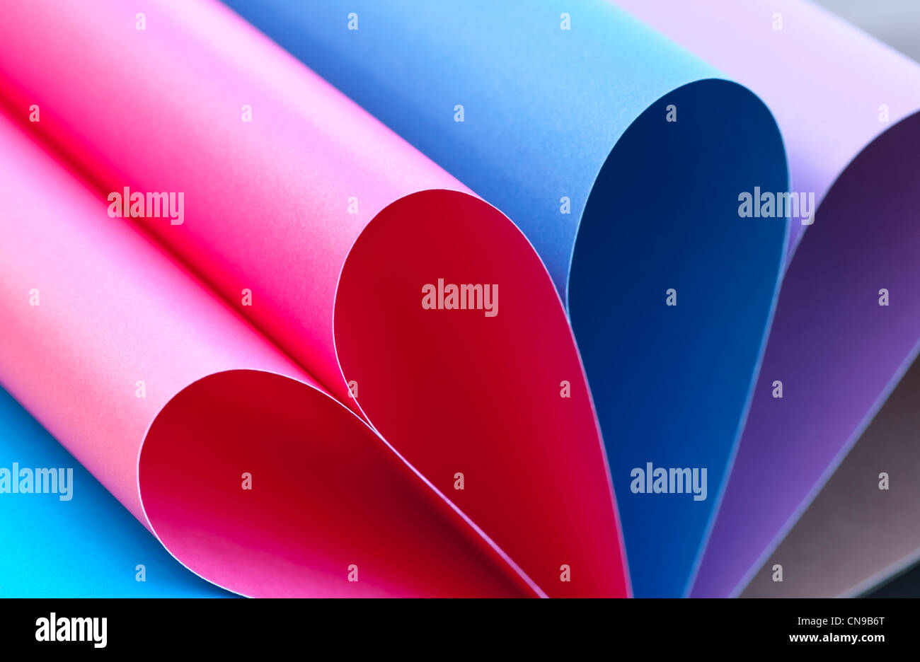 Group of colored paper sheets in unusual shape. Back to school concept ...