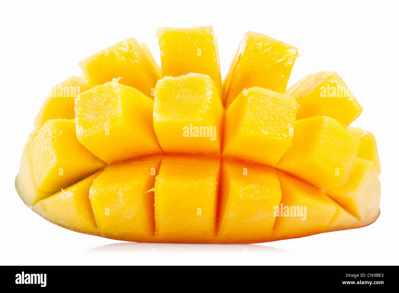 Slice of mango on a white background Stock Photo - Alamy
