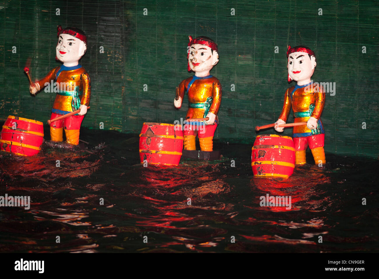 Water puppets, drummers drumming, Thang Long Water Puppet Theatre ...