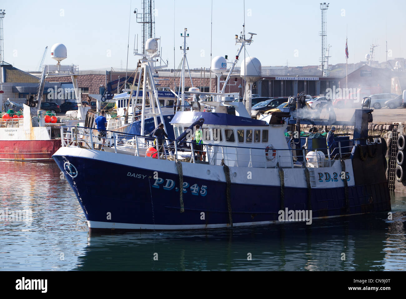 Deep sea trawlers alongside, the fishing town, the port of Peterhead .N ...