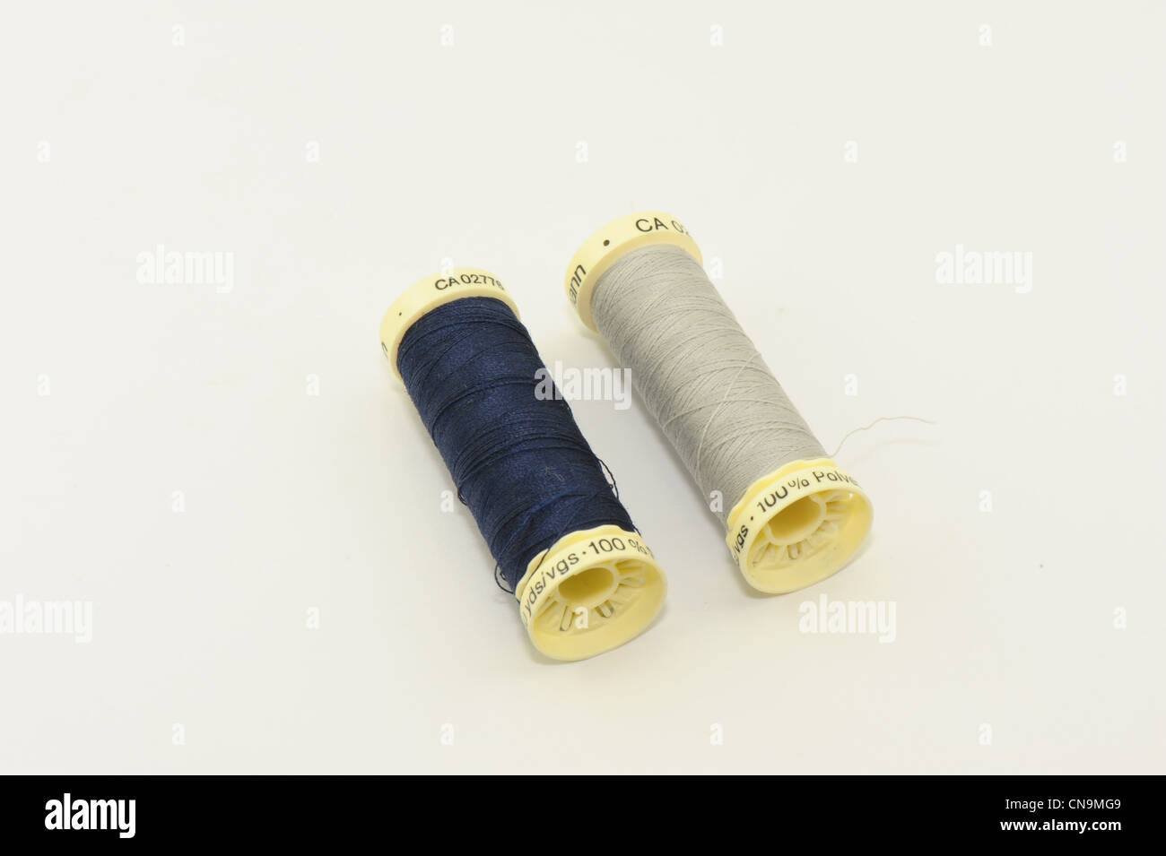 cotton reels taken on a white background sewing thread for needlework ...