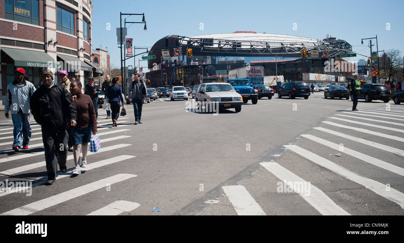 Traffic and pedestrians at the intersection of Flatbush and Atlantic ...