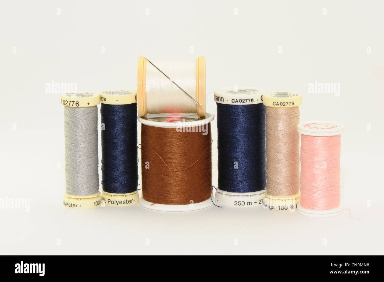 cotton reels taken on a white background sewing thread for needlework ...