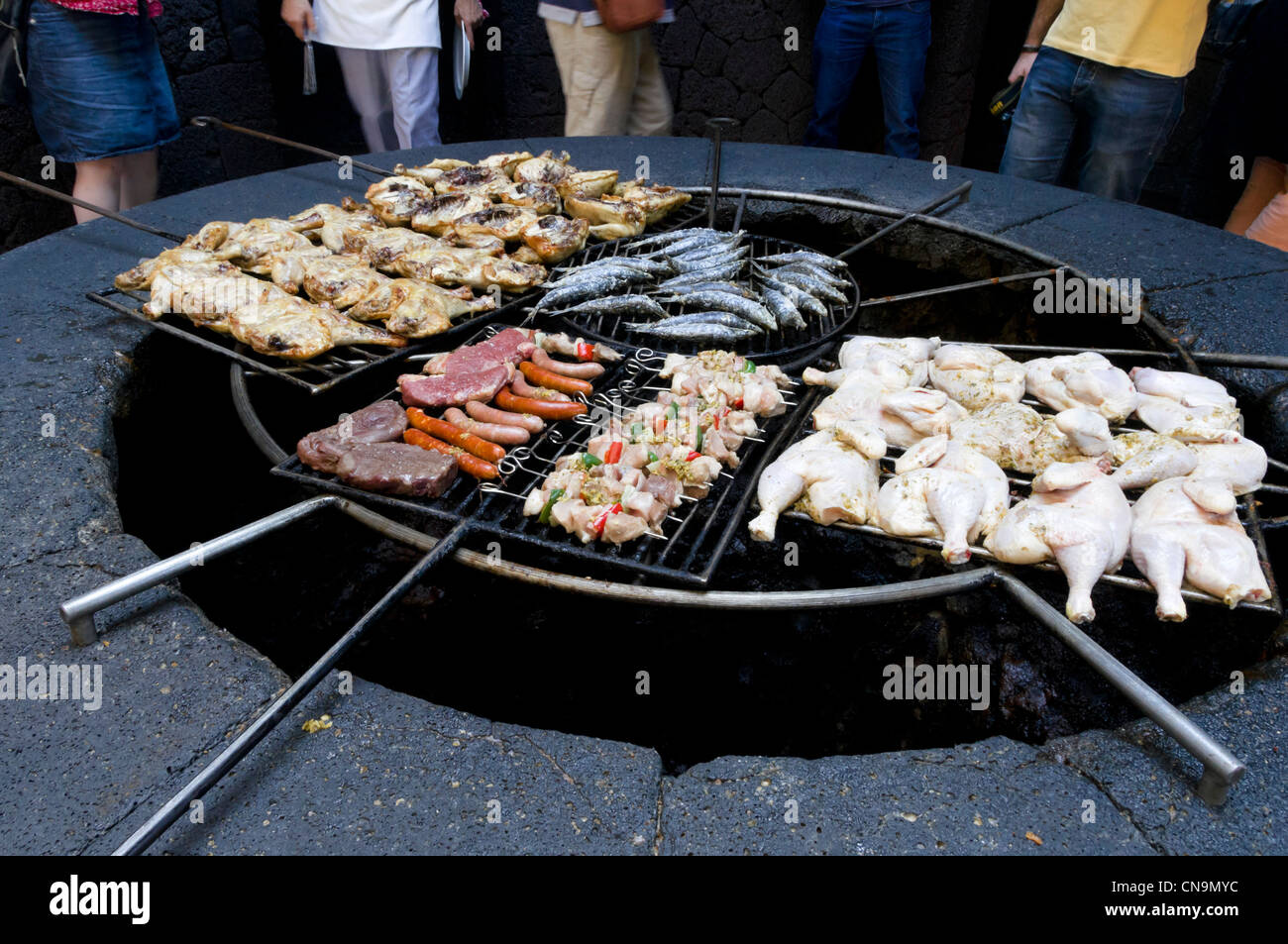 Timanfaya volcanoes national park and Visitor Centre zone. Cooking on a ...