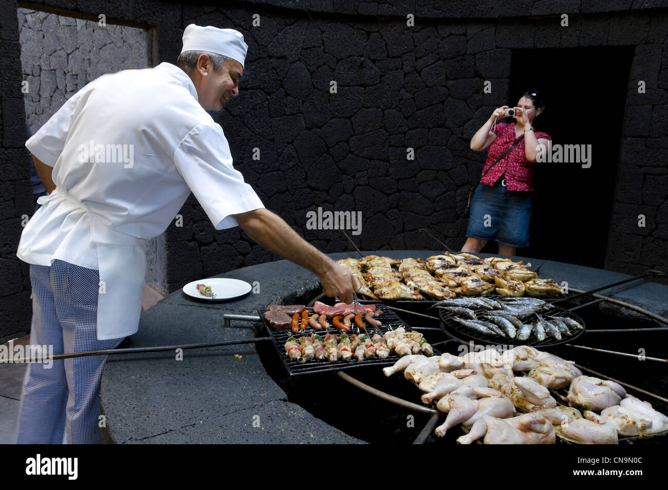 Timanfaya volcanoes national park and Visitor Centre zone. Cooking on a ...