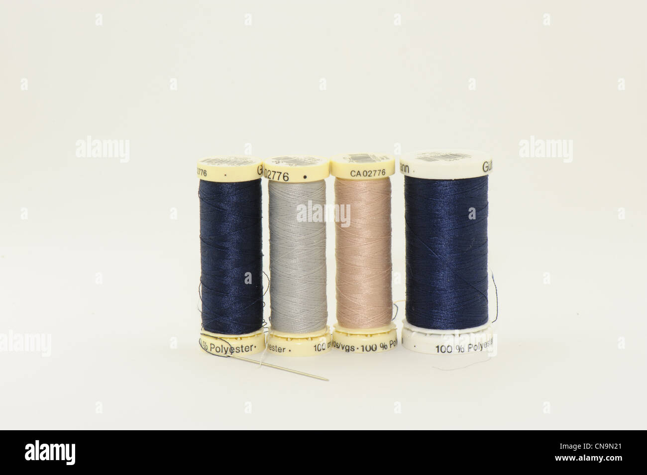 cotton reels taken on a white background sewing thread for needlework ...
