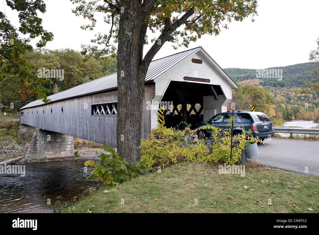 A historic New England covered bridge located in Dummerston Vermont ...